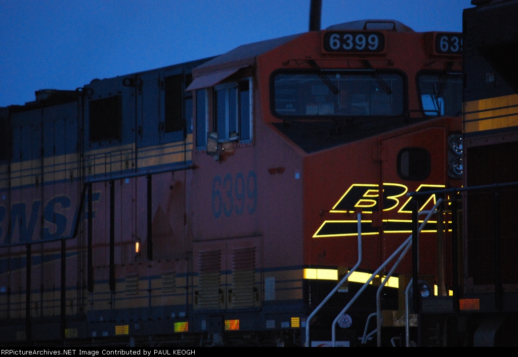 Close up shot of BNSF 6399 as she reflects her BNSF Swoosh logo in this early am shot.